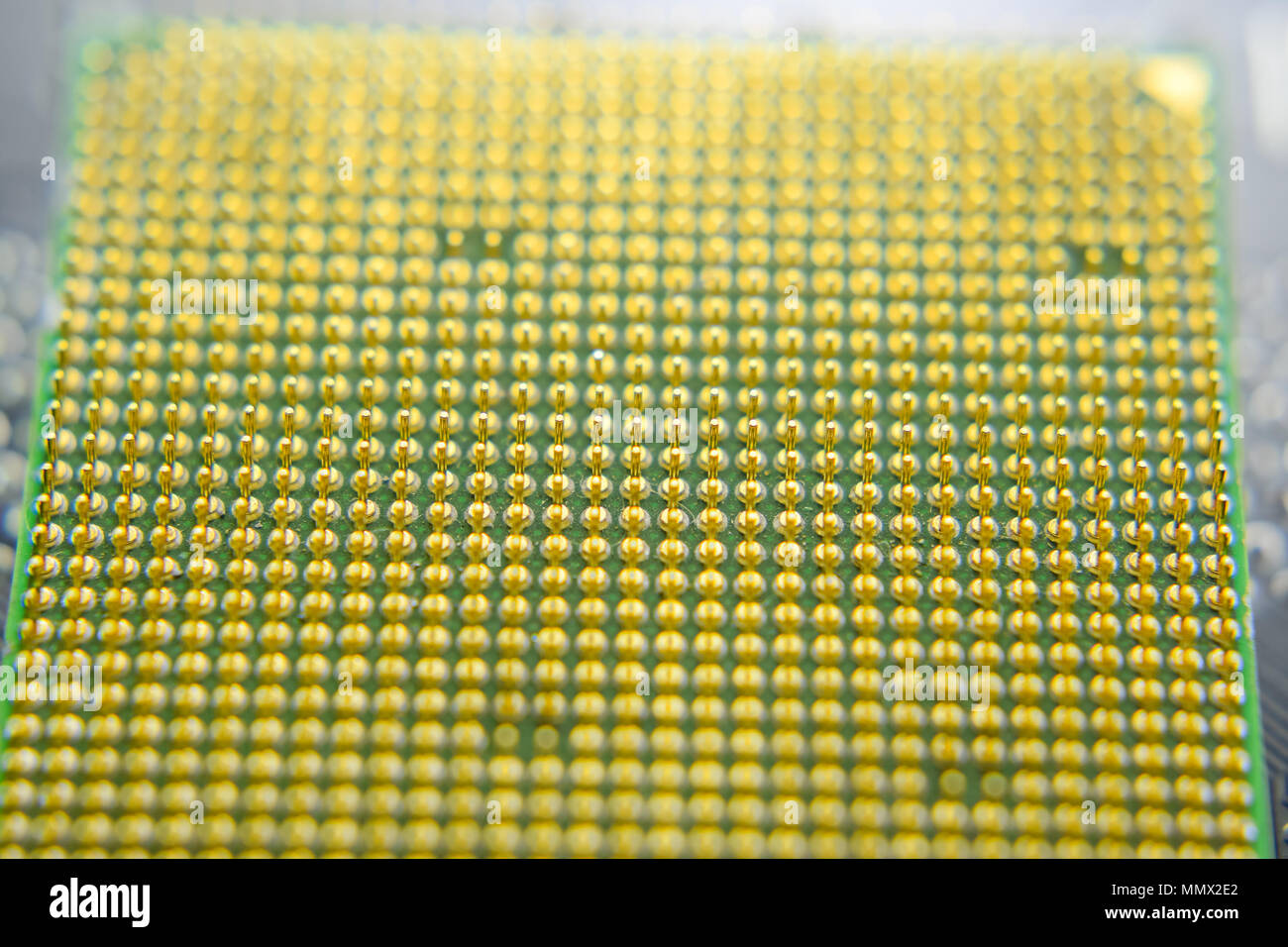 Computer processor, contact feet. Electronic board with electrical ...