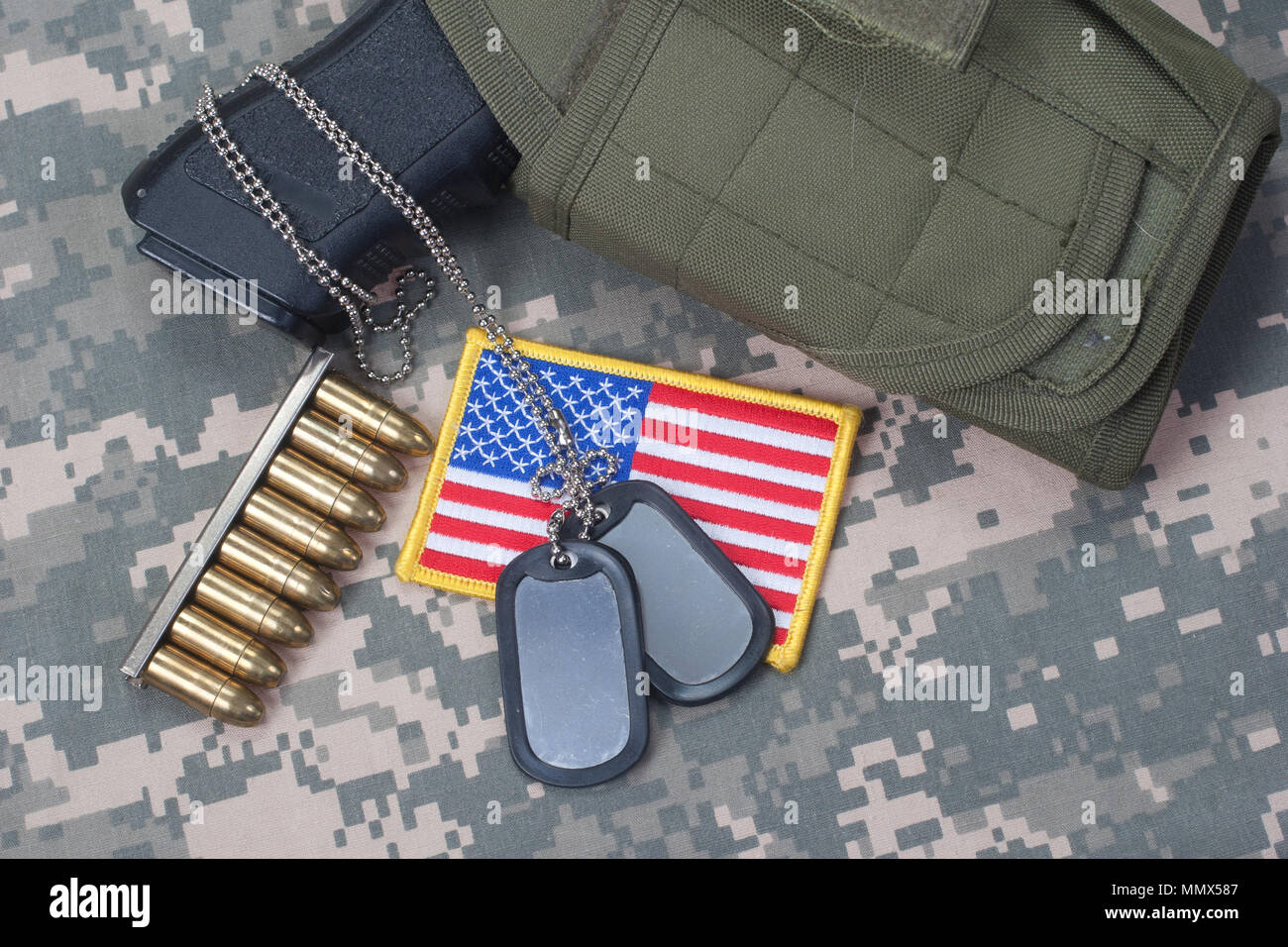 US ARMY concept with handgun on camouflage uniform Stock Photo - Alamy