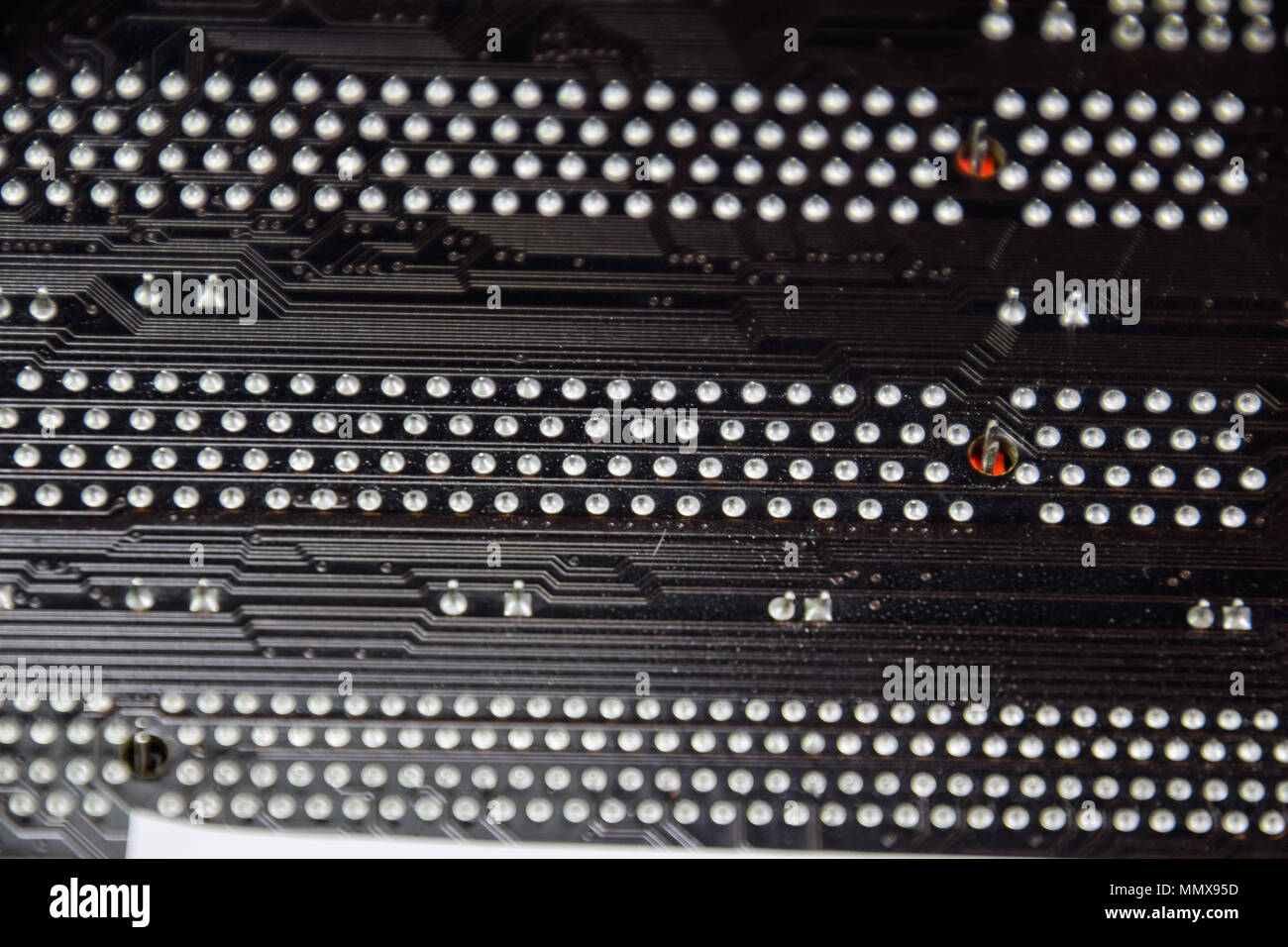 The reverse side of the microboard. Contacts solder. Soldered parts ...