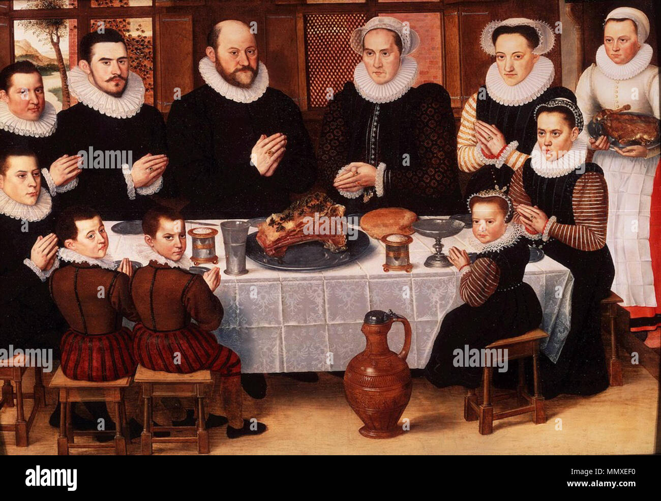 Christian family saying grace hi-res stock photography and images - Alamy