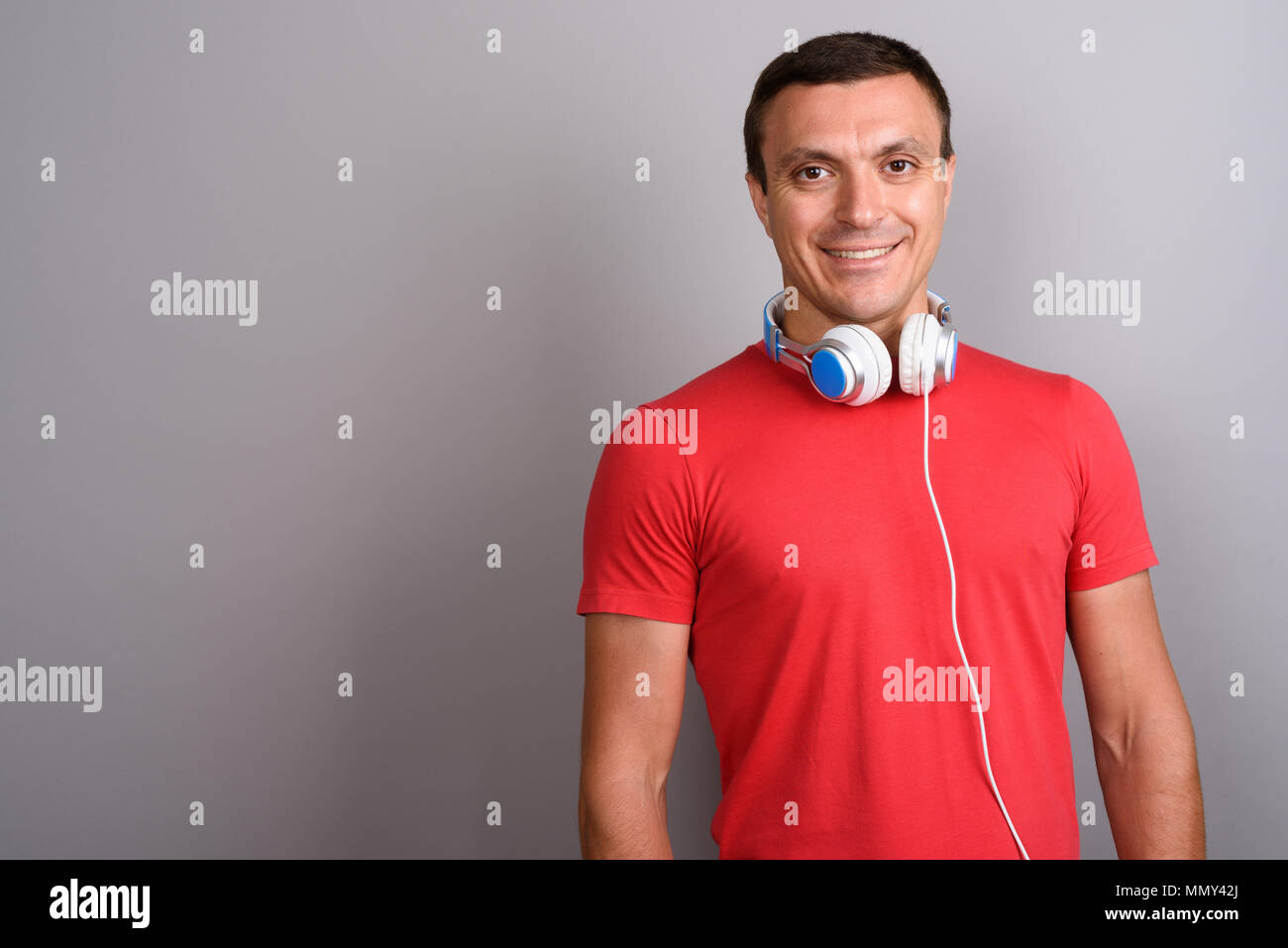 Man headphones around neck portrait hi-res stock photography and images ...