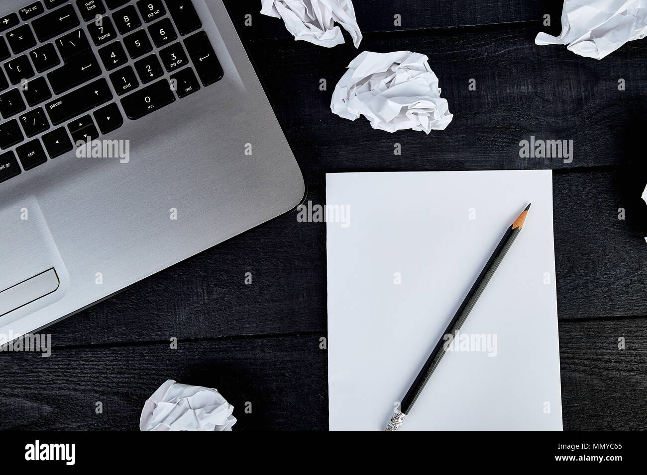 Concept in search ideas. Creased paper of idea. Modern workplace with ...