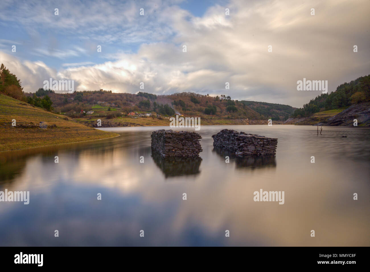 Ruins on the waters of the reservoir of Belesar, in Portomarín, Lugo ...