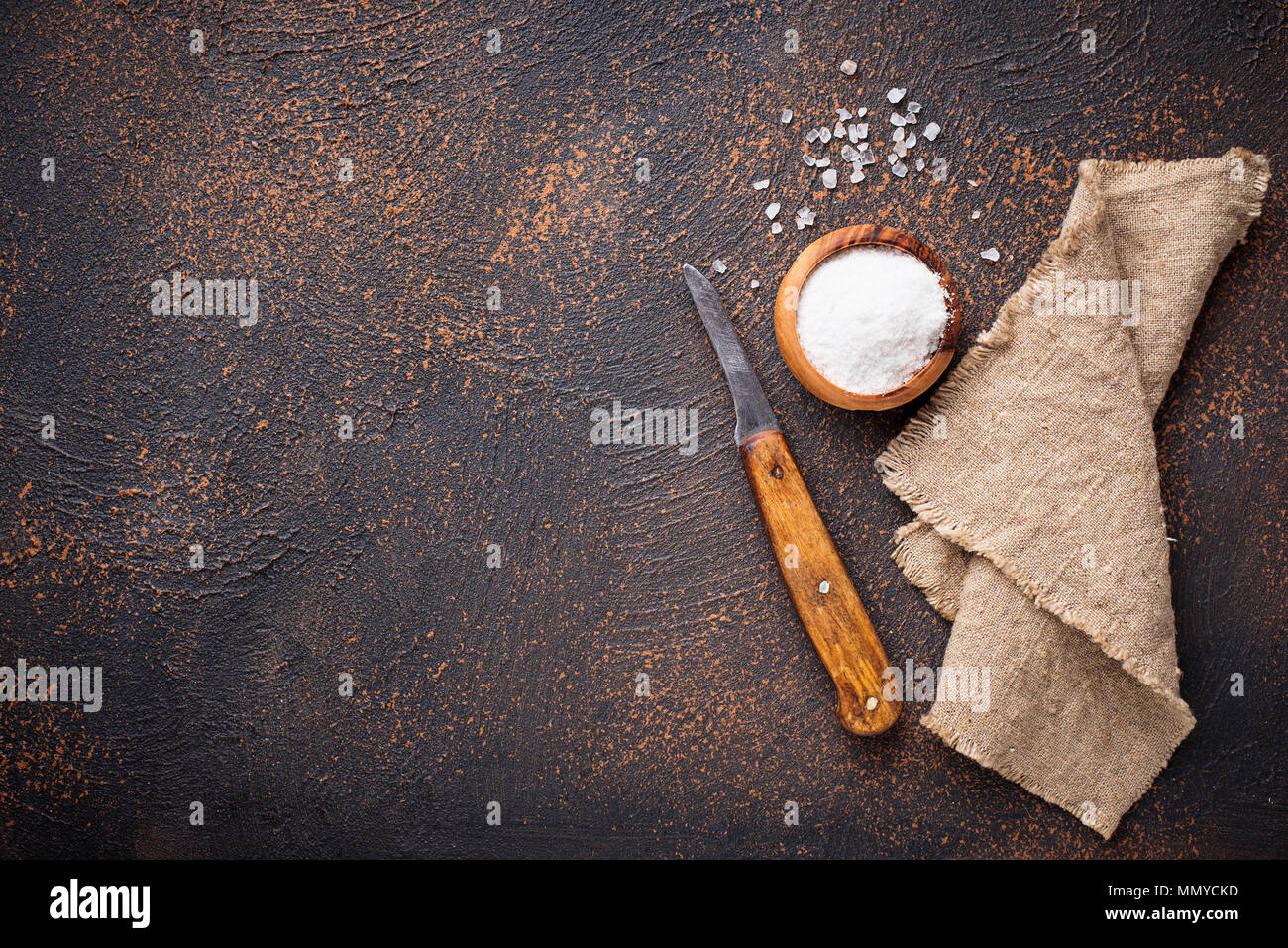 Culinary background with salt and knife Stock Photo - Alamy