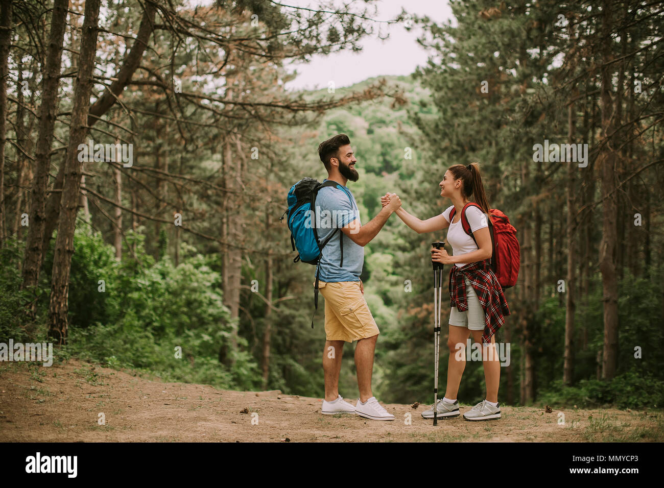Two hikers taking in hi-res stock photography and images - Alamy