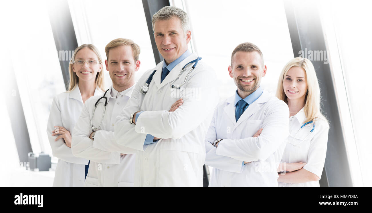 Successful team of medical doctors are looking at camera Stock Photo ...