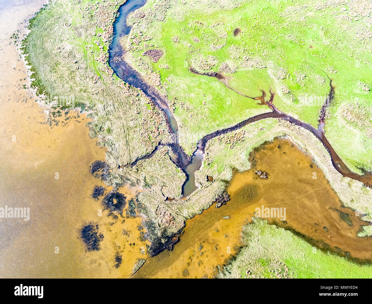 Aerial view of the Glaslyn Marshes close to the railway with the ...