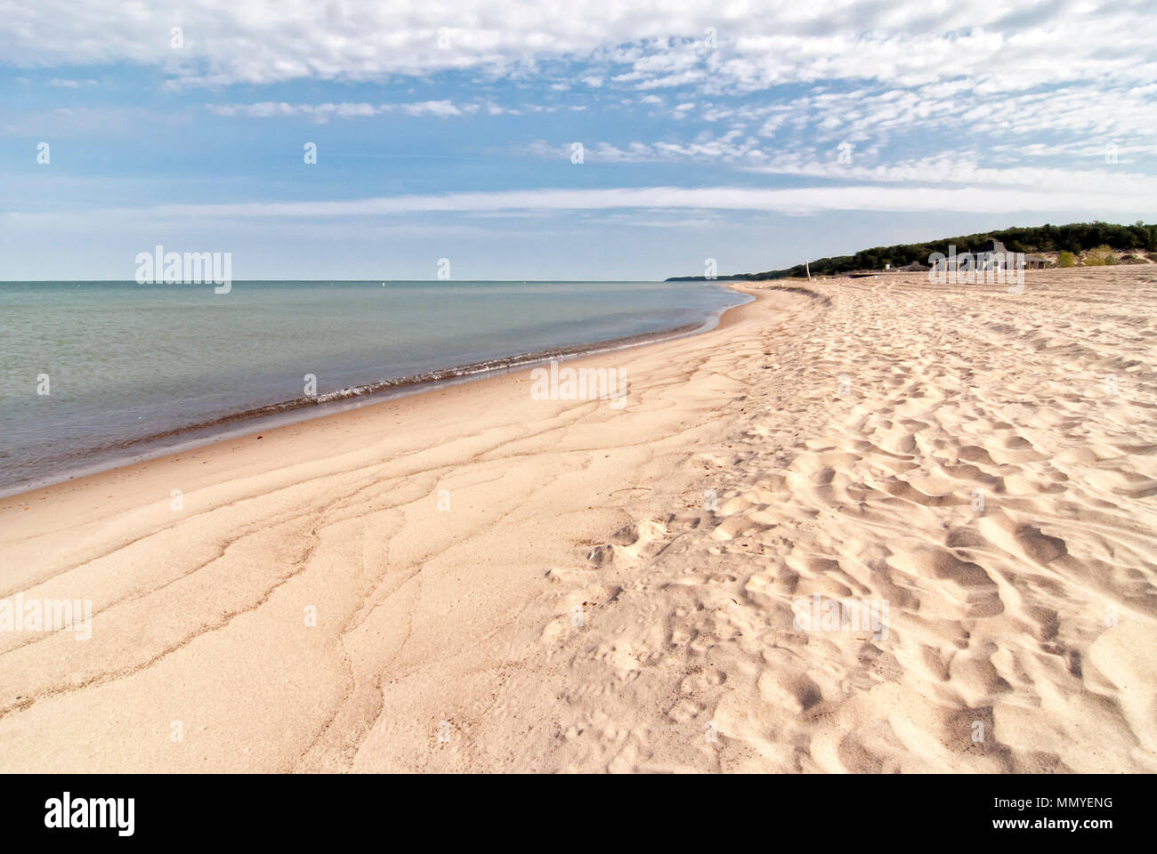 Looking down the white sand beach on Lake Michigan near St. Joeseph ...