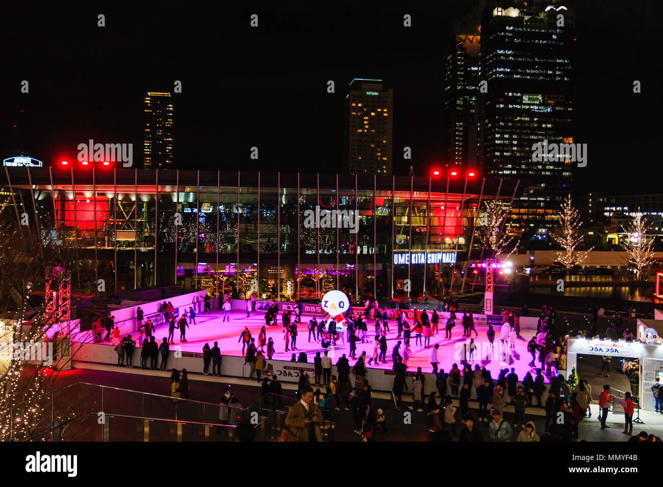 Osaka. Osaka Station City. People ice skating on Christmas day at ...