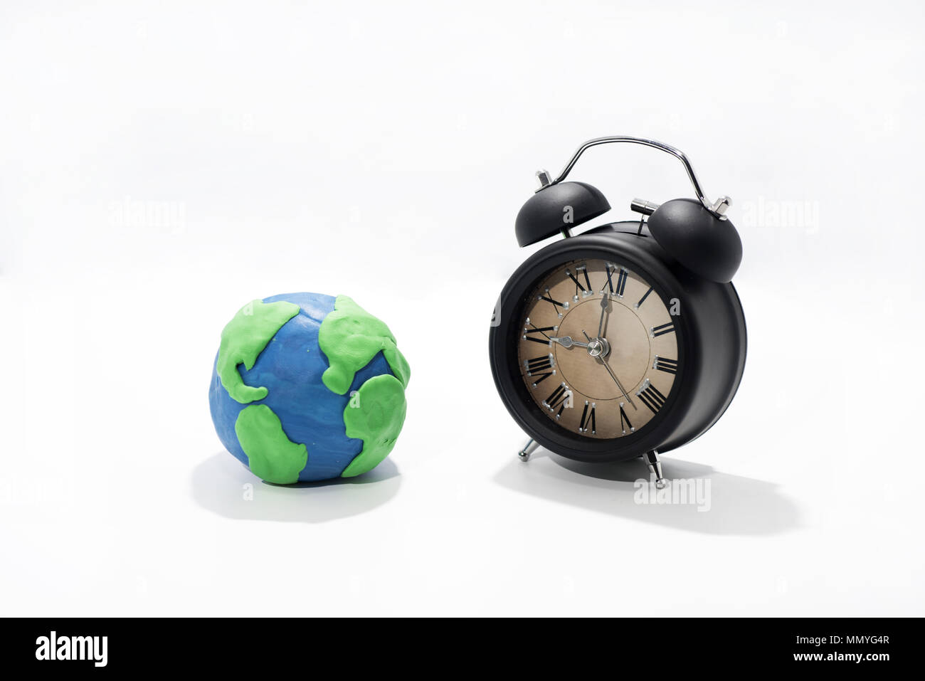 Small Earth model with human hands. Abstract composition of peace Stock ...