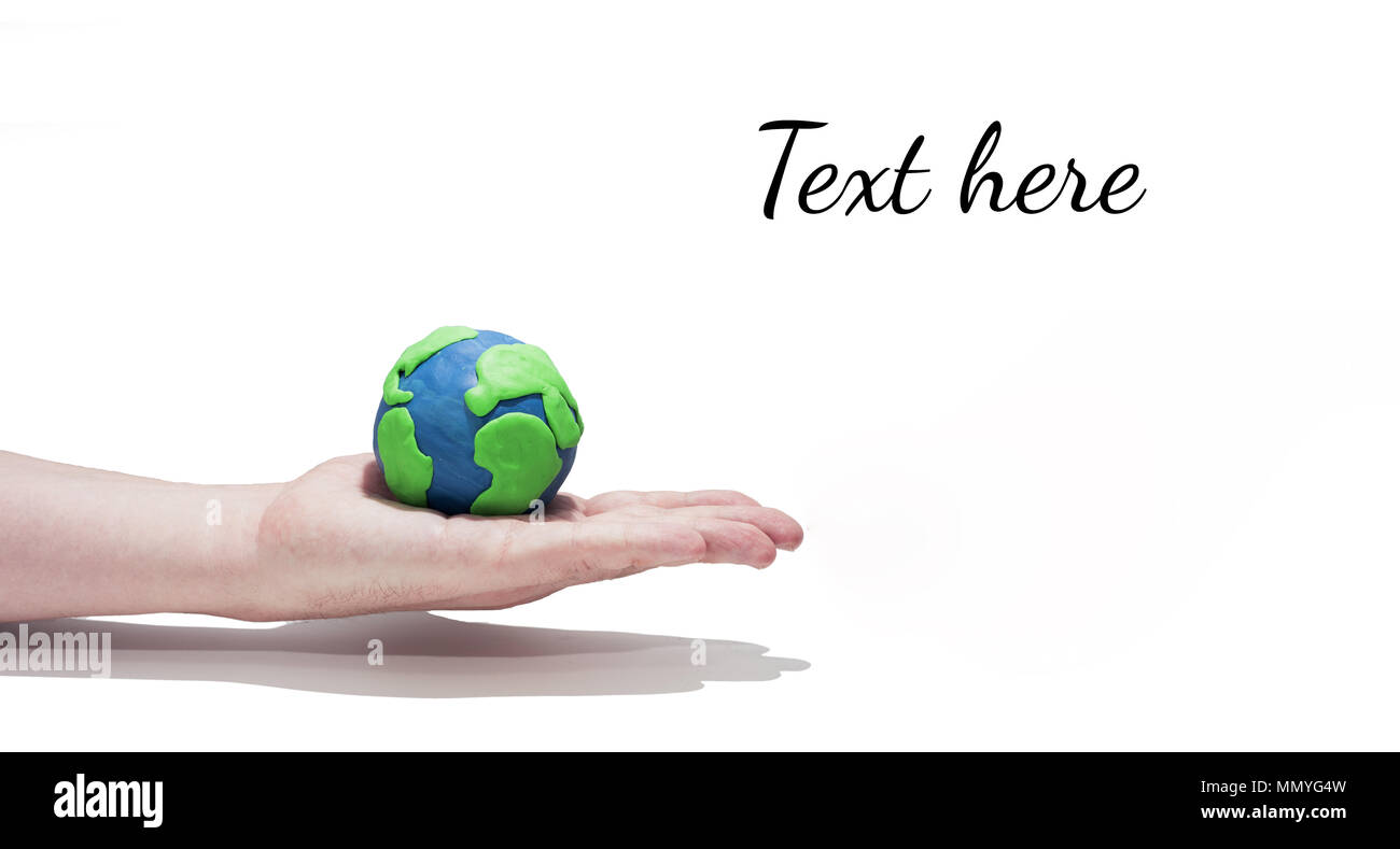 Small Earth model with human hands. Abstract composition of peace Stock ...