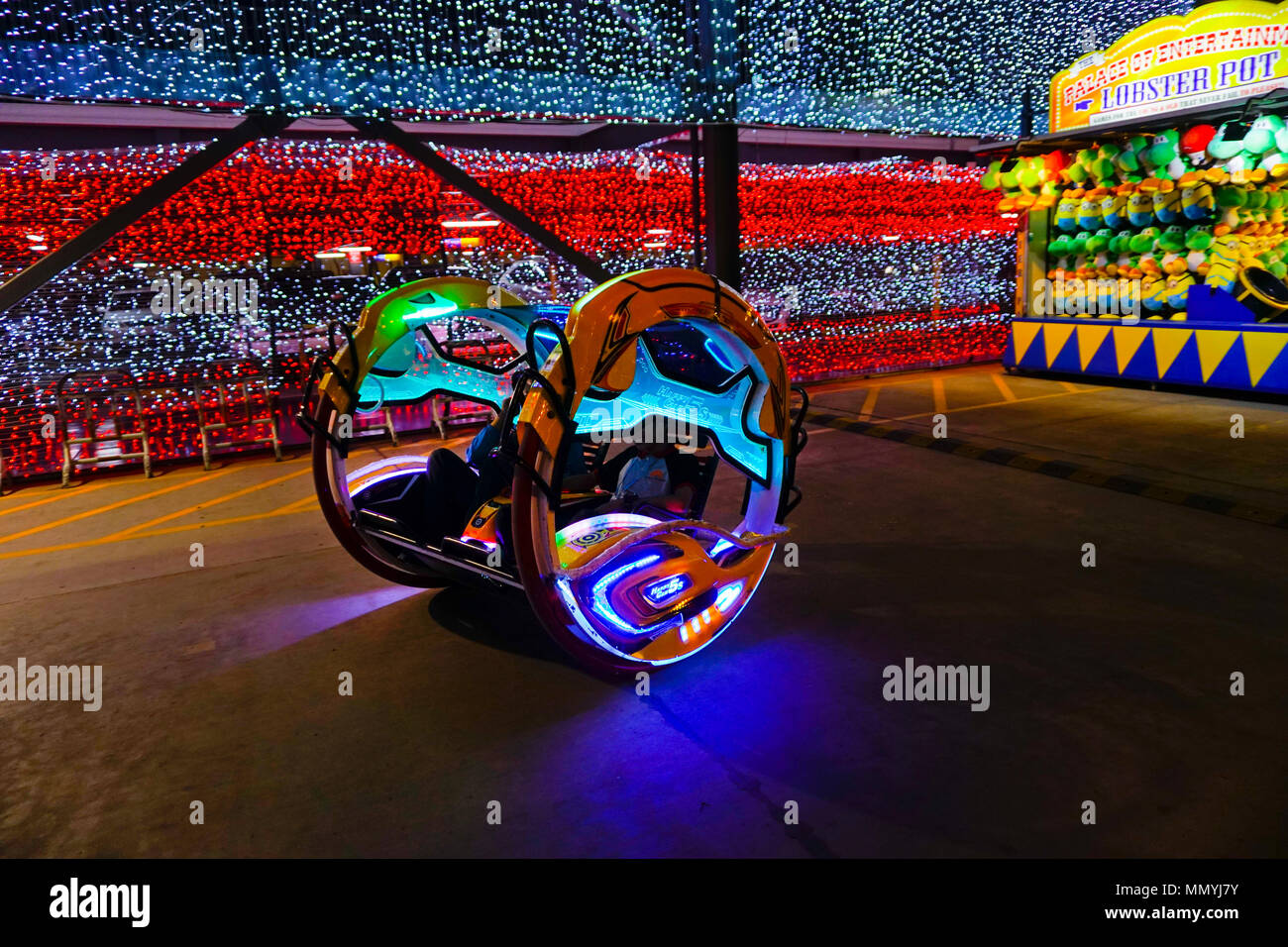 Gyroscopic car ride, Phnom Pehn, Cambodia Stock Photo - Alamy