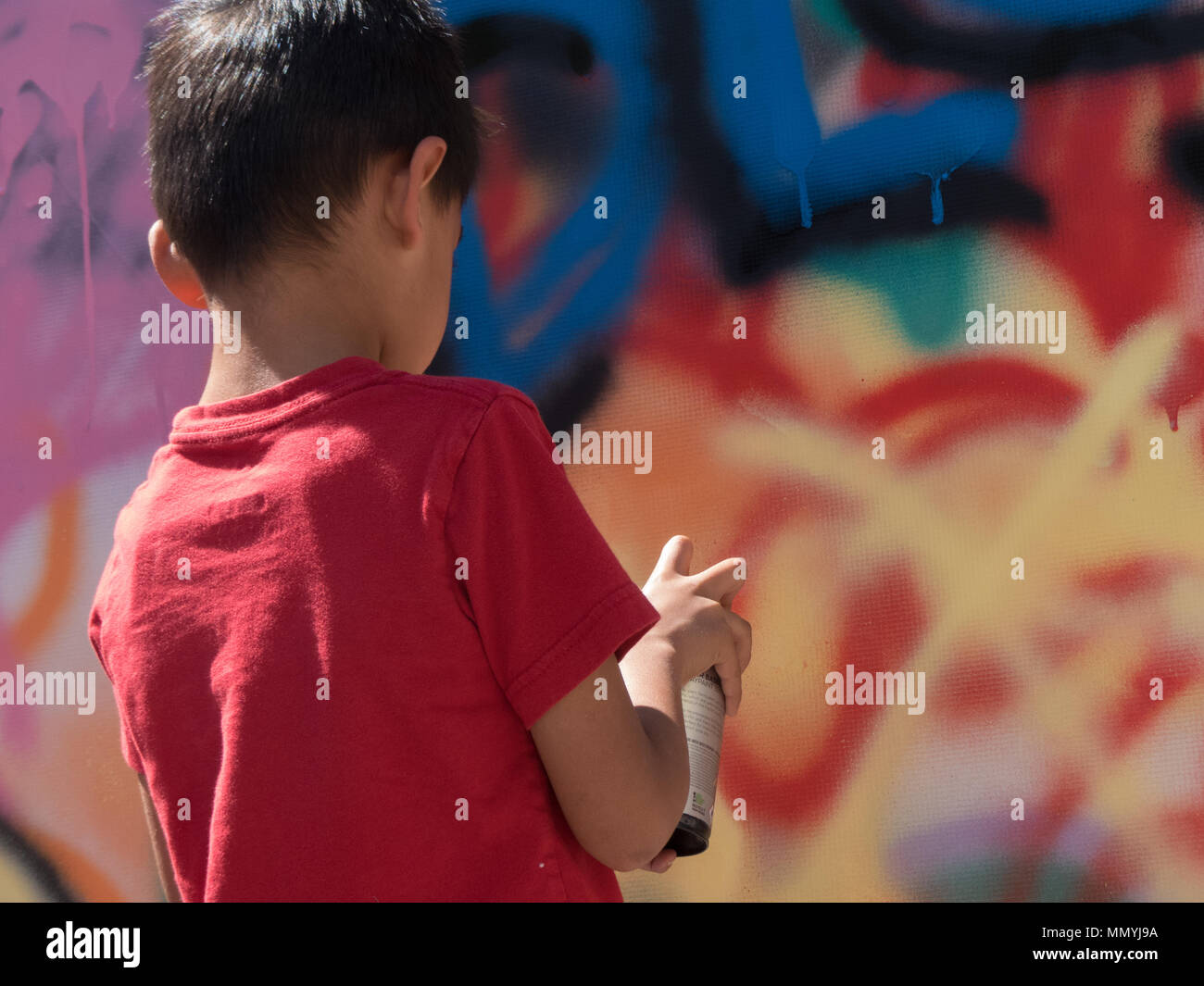 Street art graffiti child creating murals concept creativity Stock ...