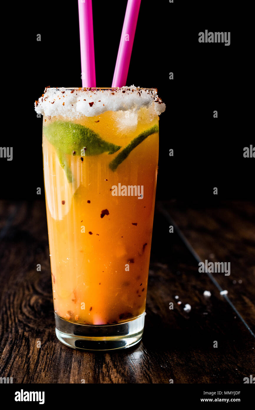 Mexican Michelada Cocktail with beer, lime, ice and spices. Beverage ...