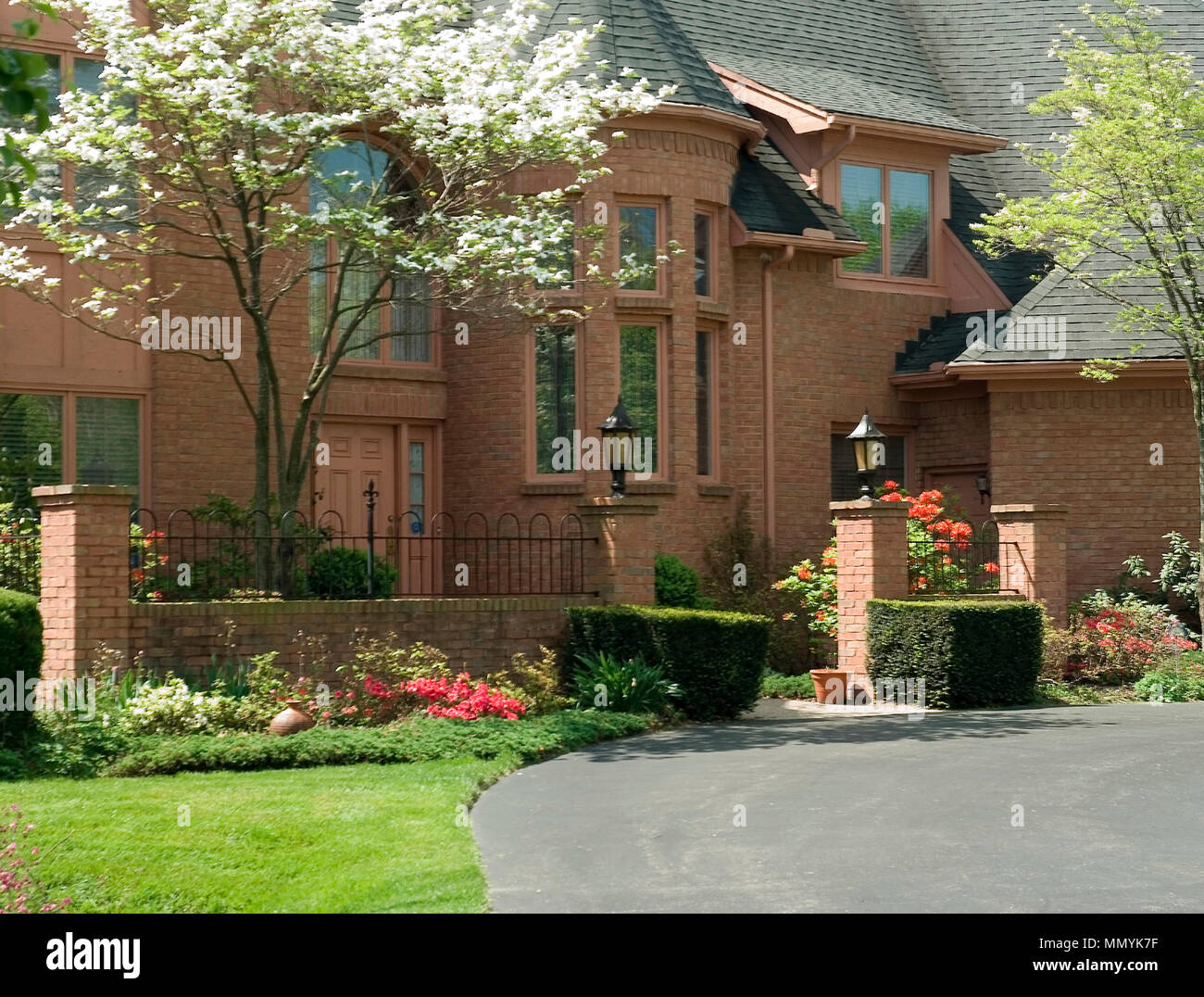 Beautiful brown brick home featuring some nice masonry details and ...