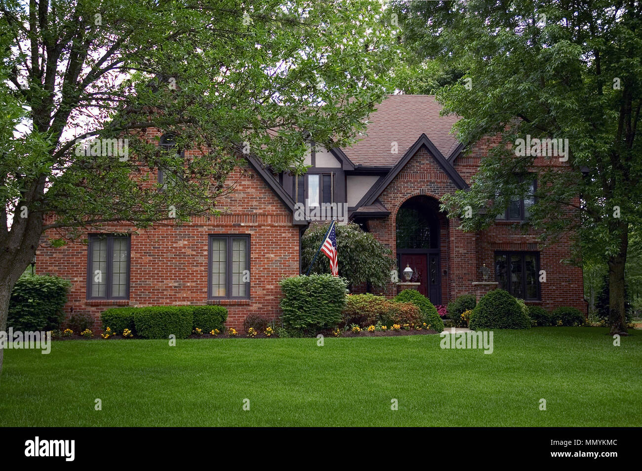 A house with the feel of a small cottage. Beautiful manicured landscape ...