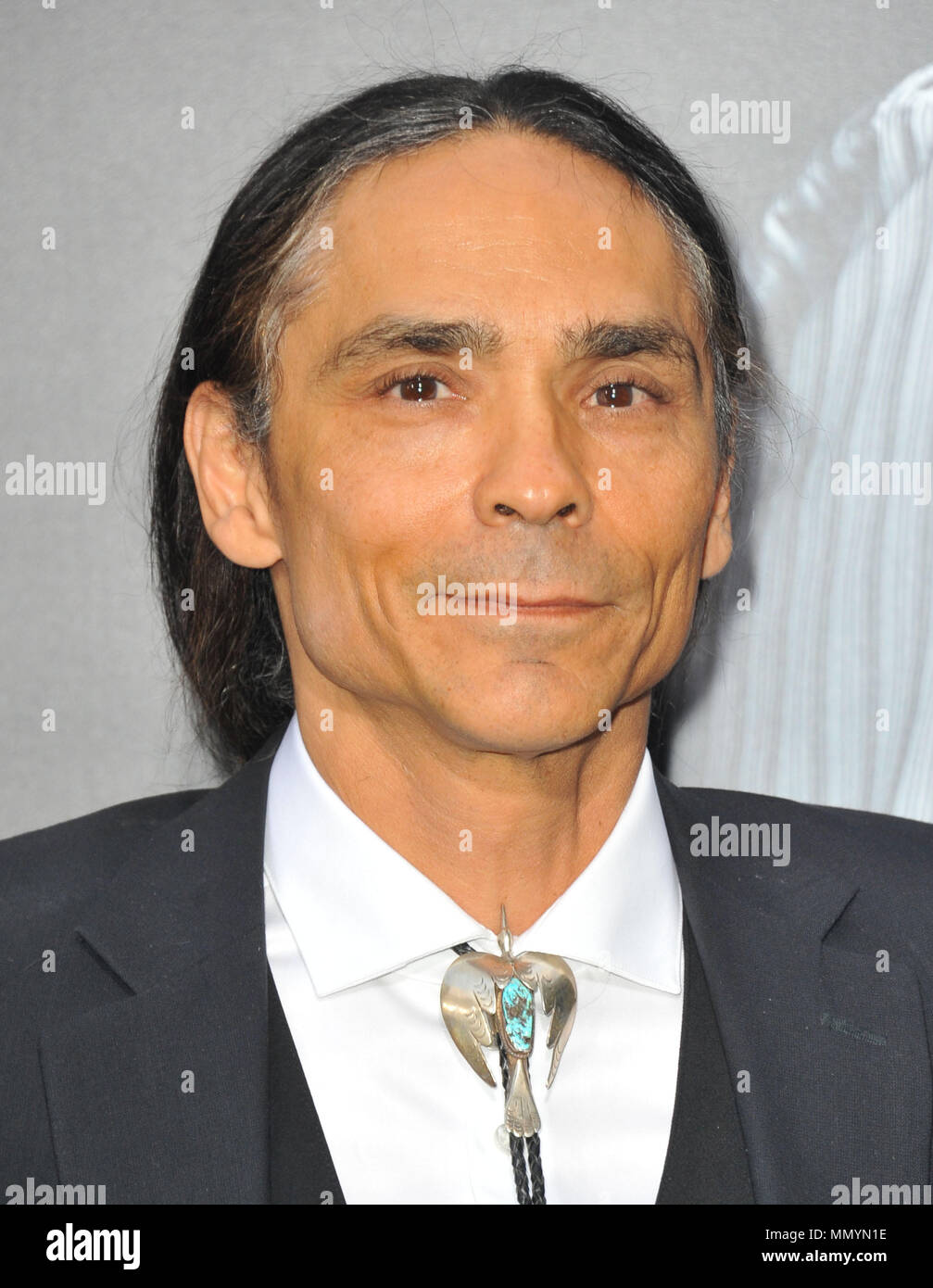 HOLLYWOOD, CA - APRIL 03: Zahn McClarnon arrives at the premiere of AMC ...