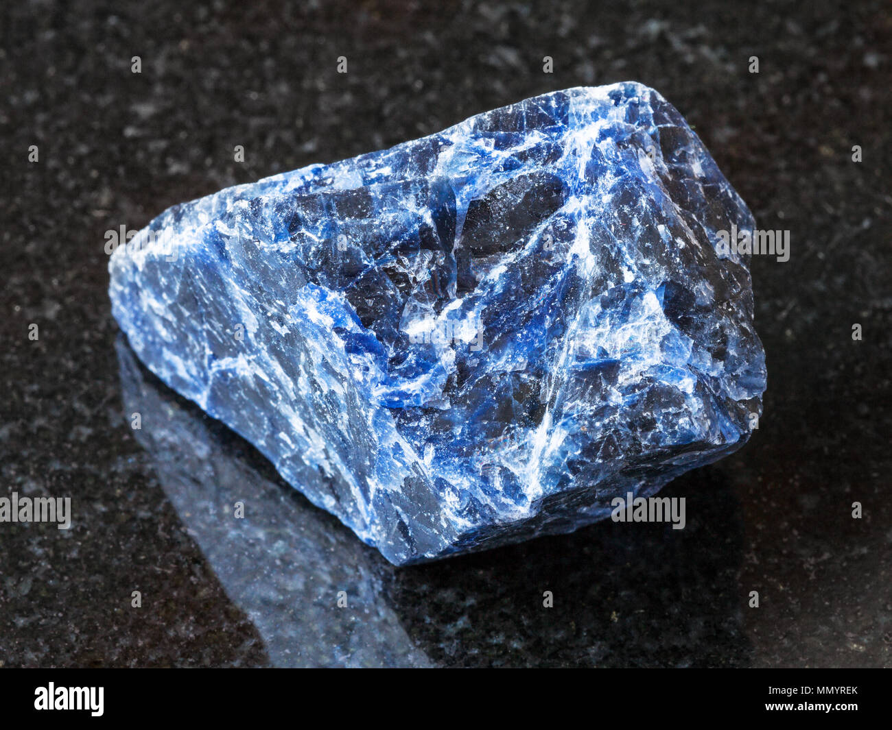 macro shooting of natural rock specimen - raw Sodalite gemstone on ...