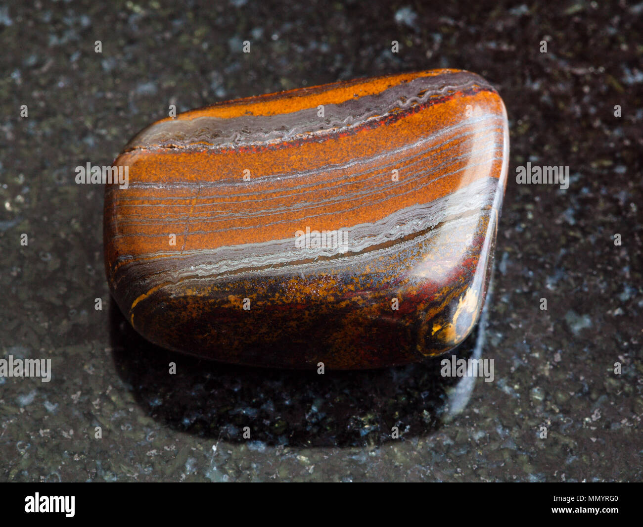 macro shooting of natural rock specimen - tumbled Jaspillite (Jaspilite ...