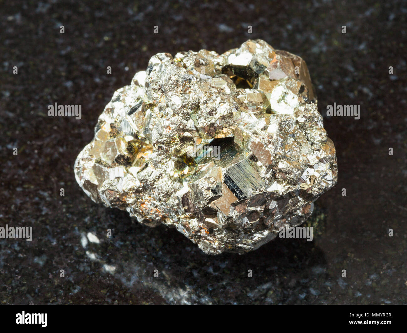 macro shooting of natural rock specimen - rough iron pyrite (fool's ...