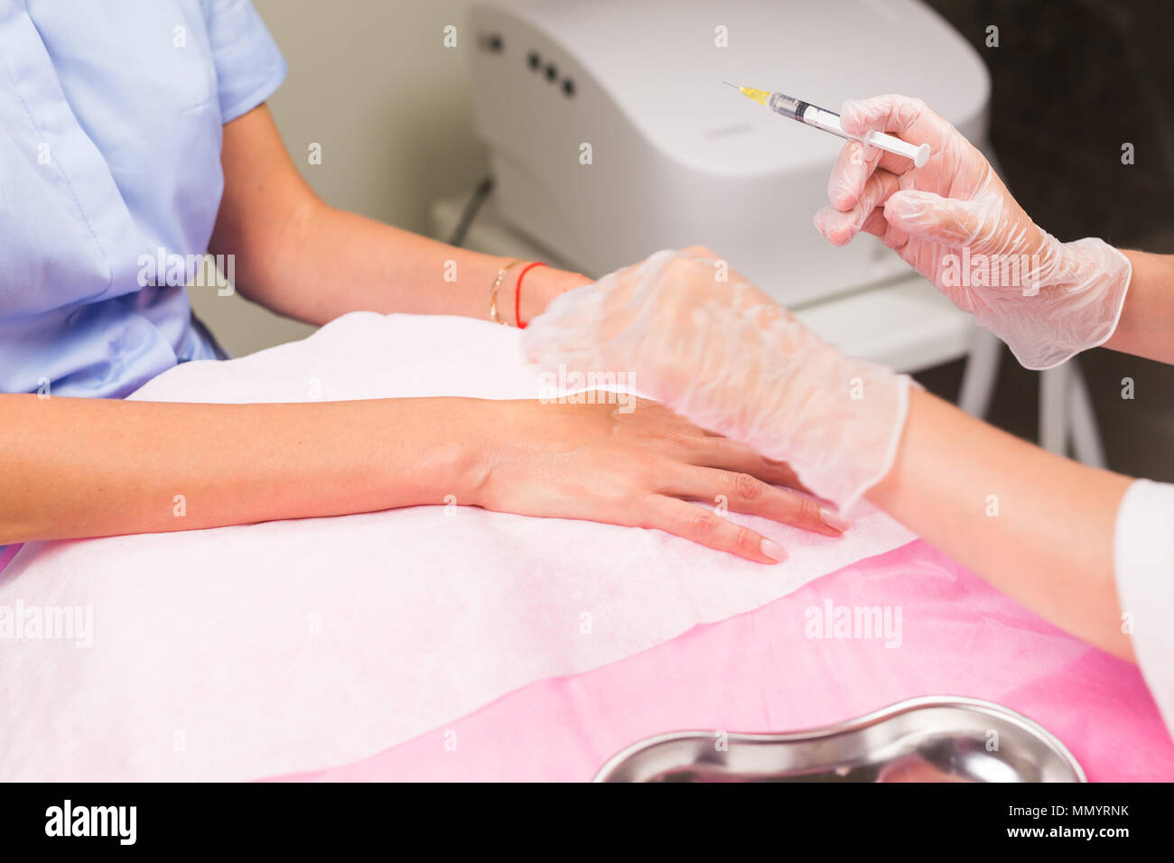 cosmetology and beauty concept - Anti-age injection therapy, hand ...