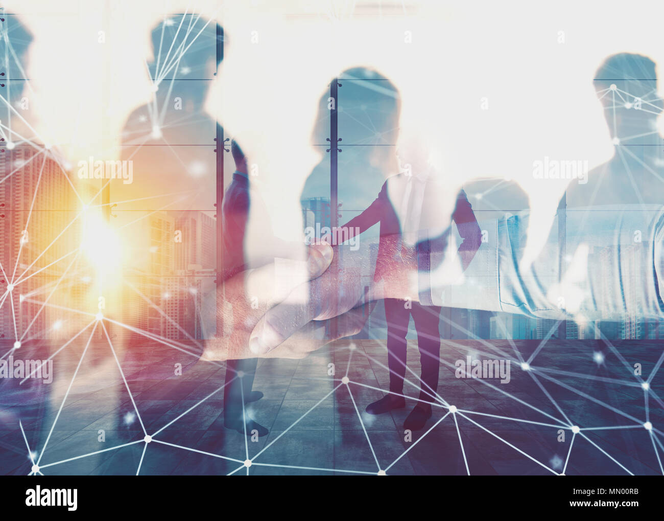 Handshaking business person in office with network effect. concept of ...