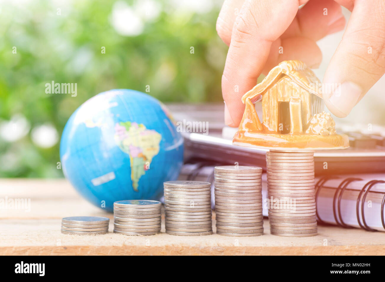 Ladder on globe hi-res stock photography and images - Alamy