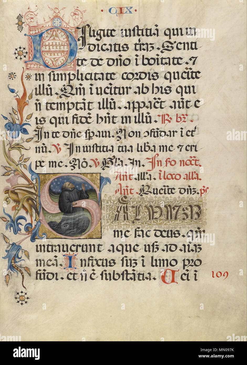 . A monk engulfed in water clings to the central curve of an initial S ...