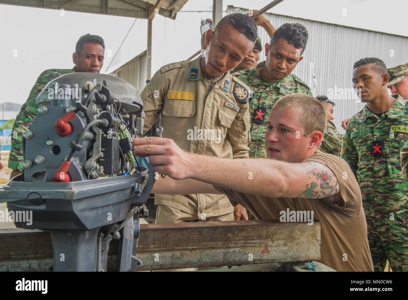 Engineman 2nd Class Noah Edwards, assigned to Coastal Riverine Group 1 ...