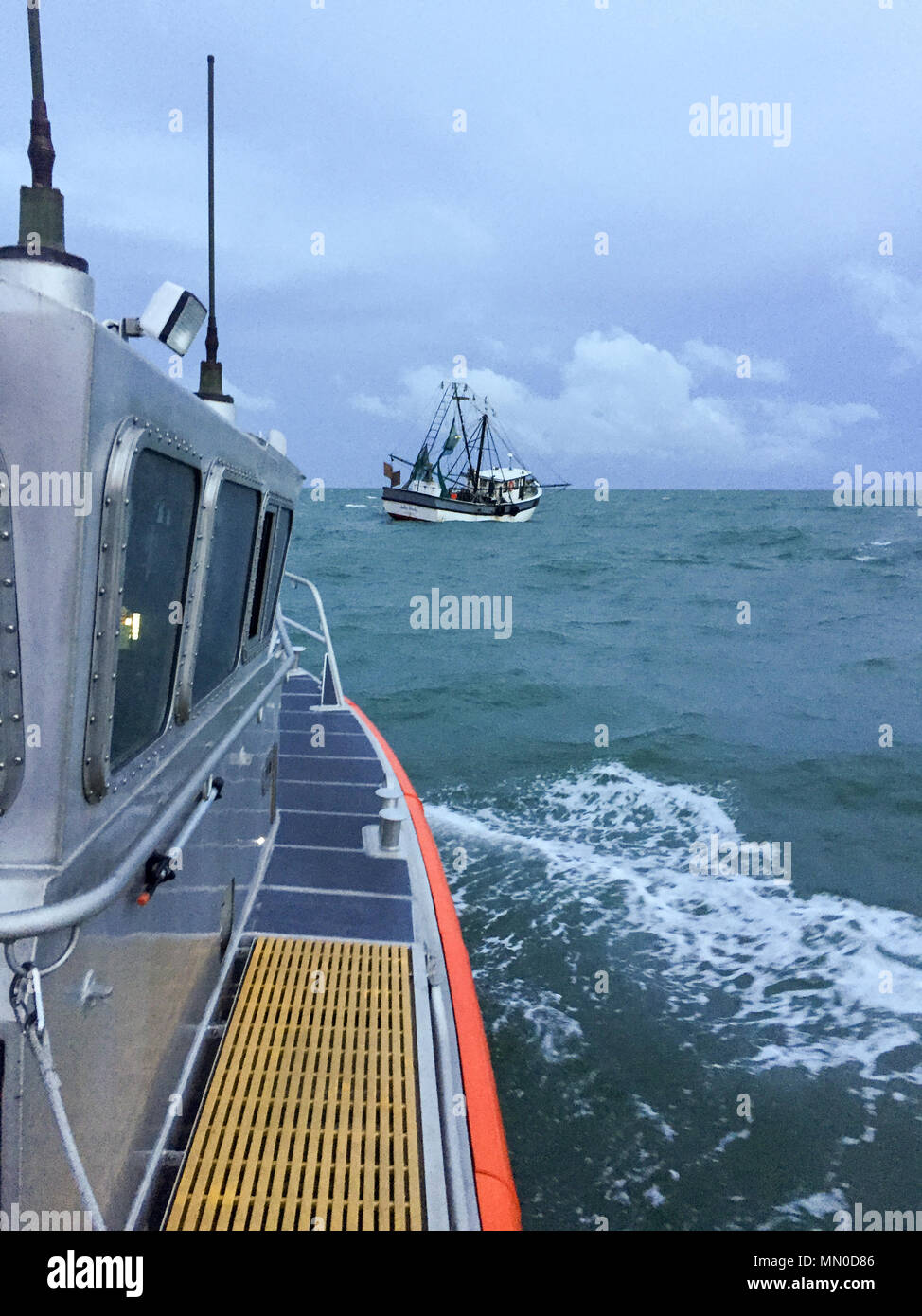 Coast Guard crewmembers aboard a 45-foot Response Boat-Medium from ...