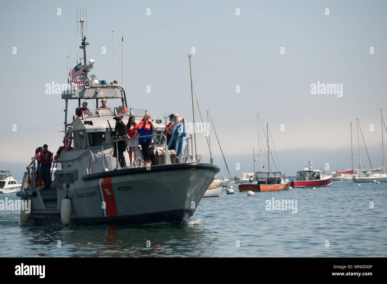 A Coast Guard Station Rockland 47-foot Motor Lifeboat crew ferries King ...