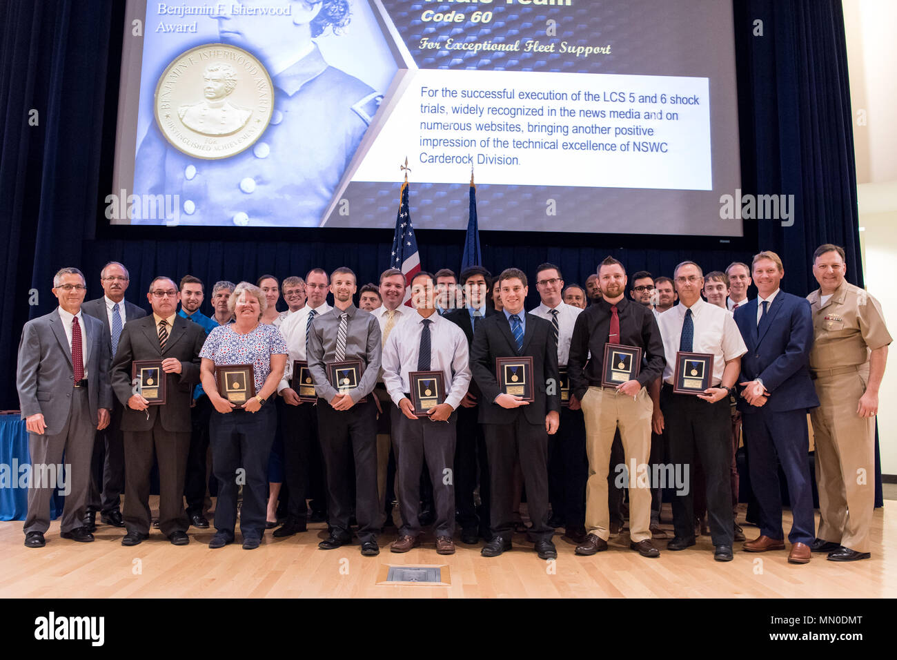 The Littoral Combat Ship (LCS) Full-Ship Shock Trials Team receives the ...