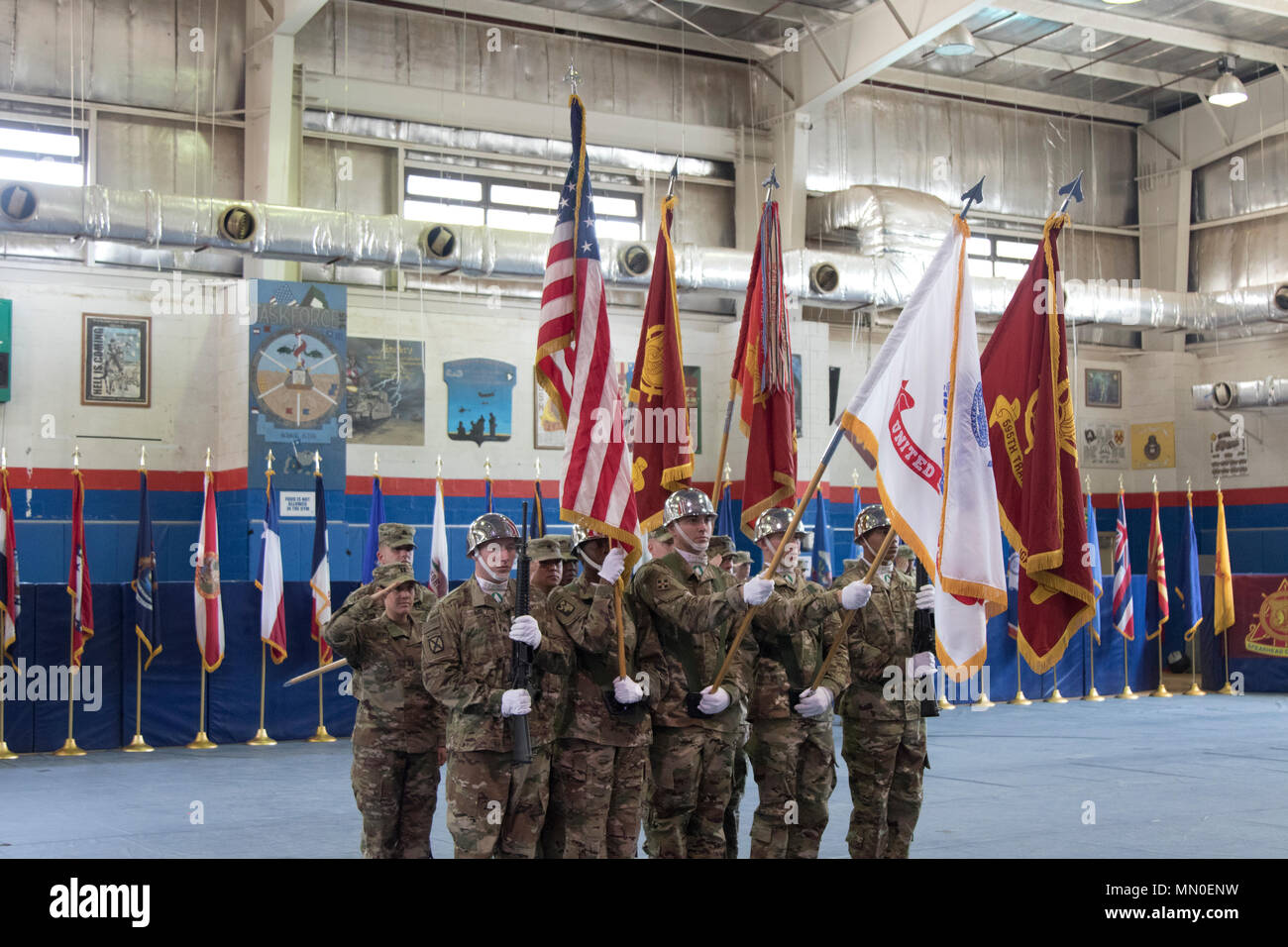 A color guard posts the colors during a change of command and change of ...