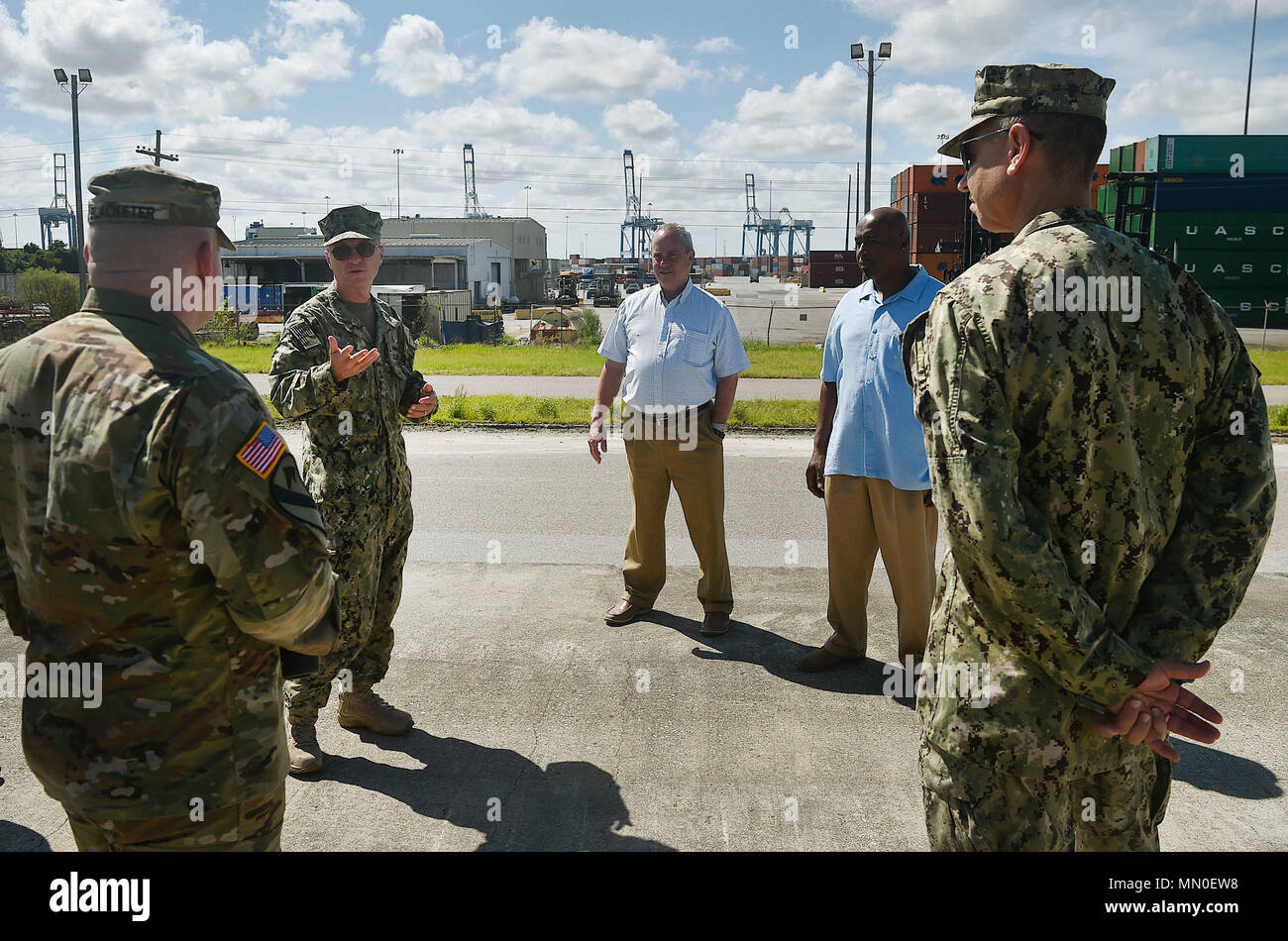 Rear Adm. Lawrence Jackson, center left, U.S. Transportation Command ...