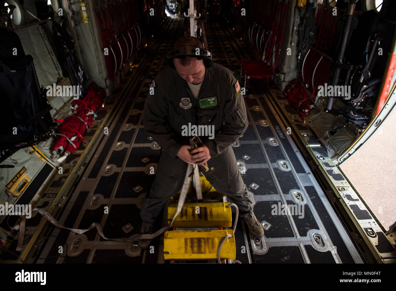 U.S. Air Force Staff Sgt. John Huberty, loadmaster, 61st AIrlift ...