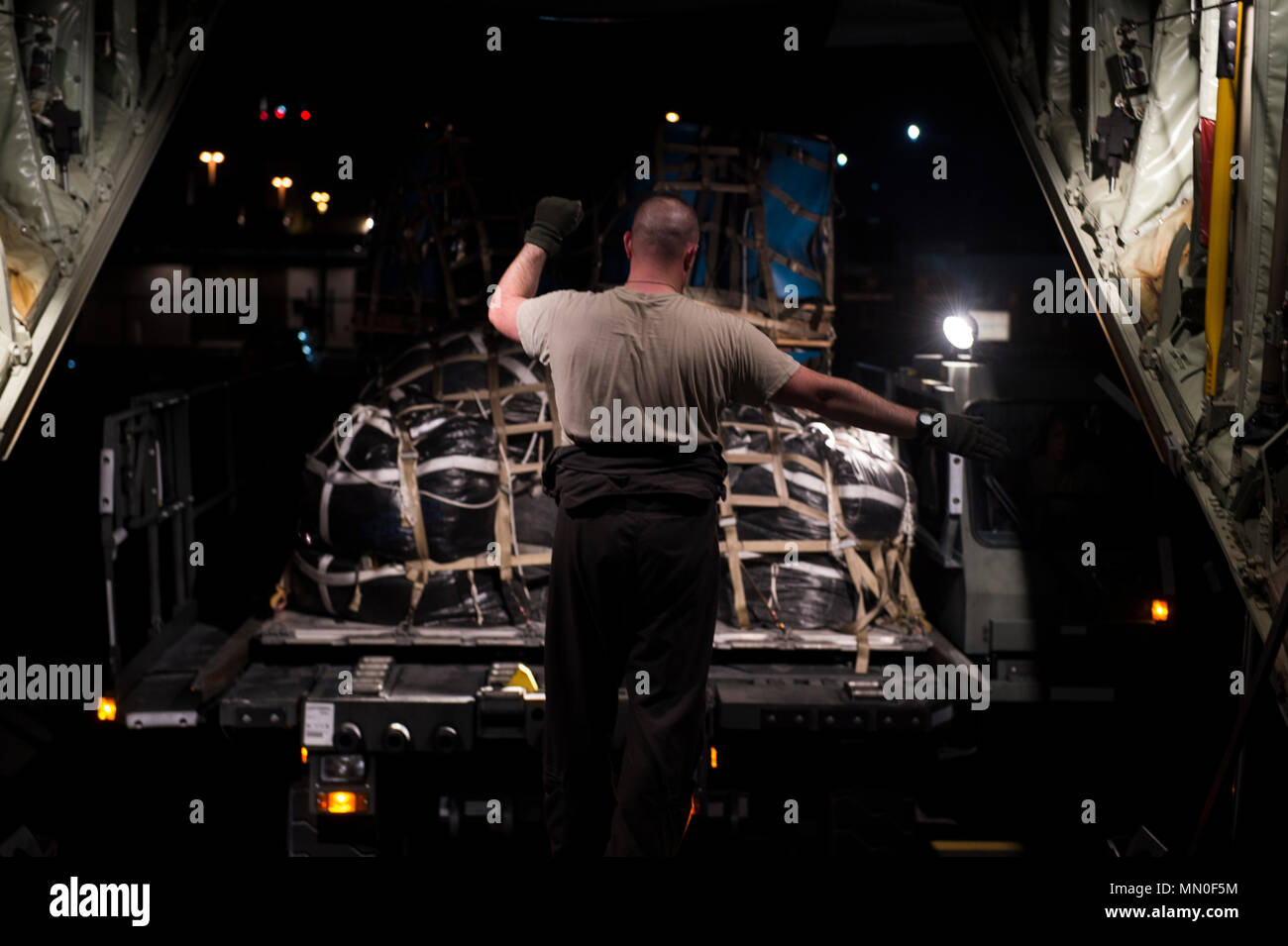 U.S. Air Force Staff Sgt. John Huberty, loadmaster, 61st Airlift ...