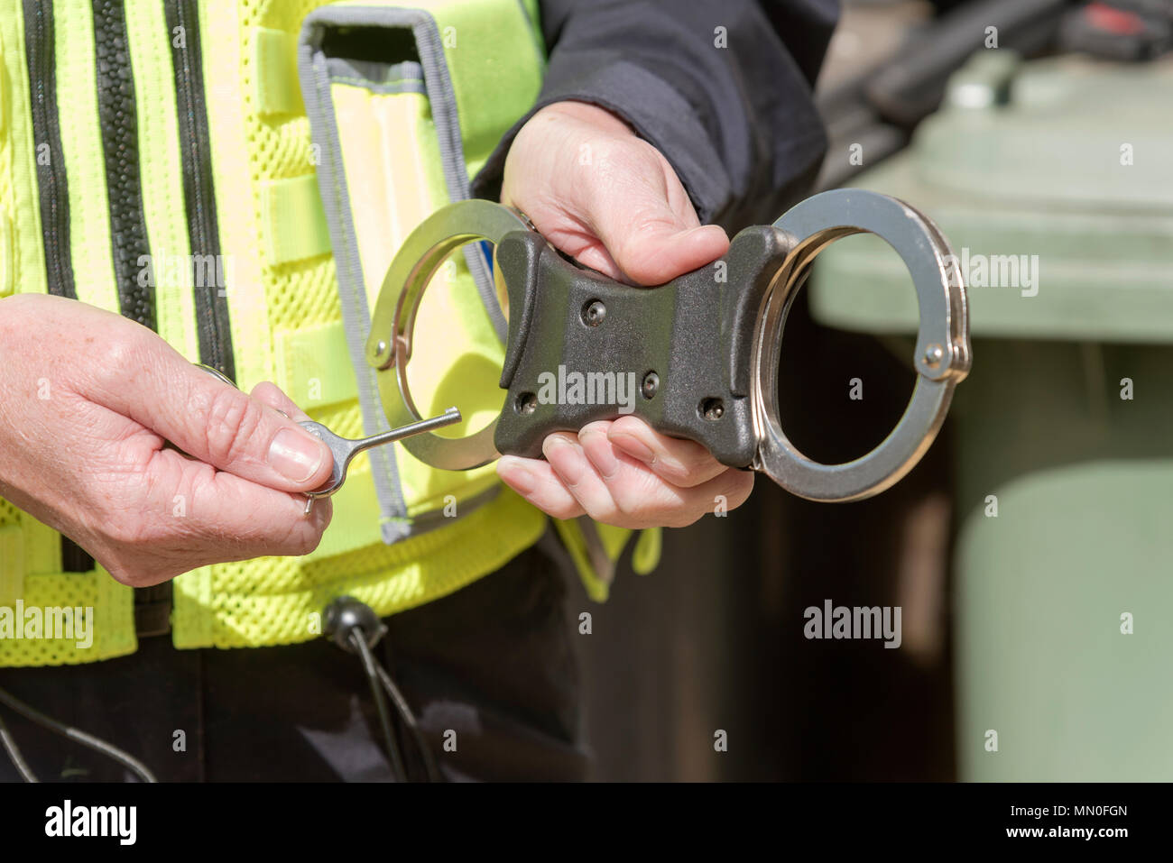 Plastic handcuffs hi-res stock photography and images - Alamy