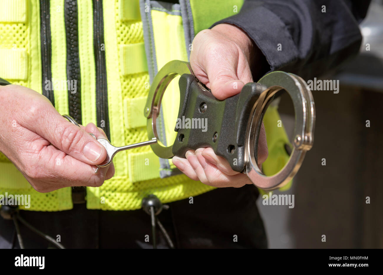Plastic handcuffs hi-res stock photography and images - Alamy