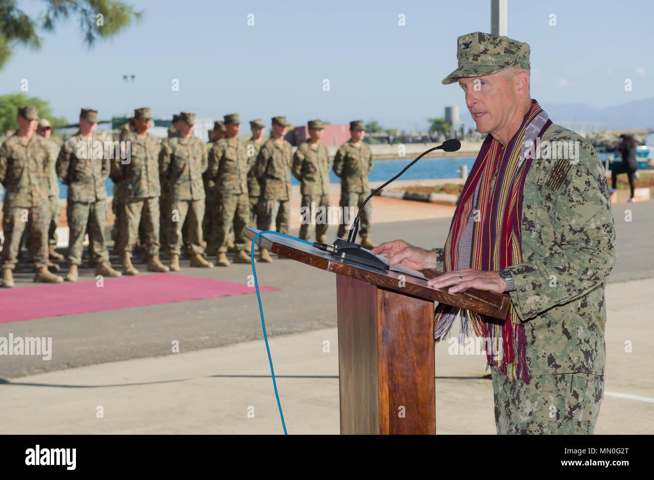 Capt. Bob Baughman, commodore of Commander, Task Force 75, speaks ...