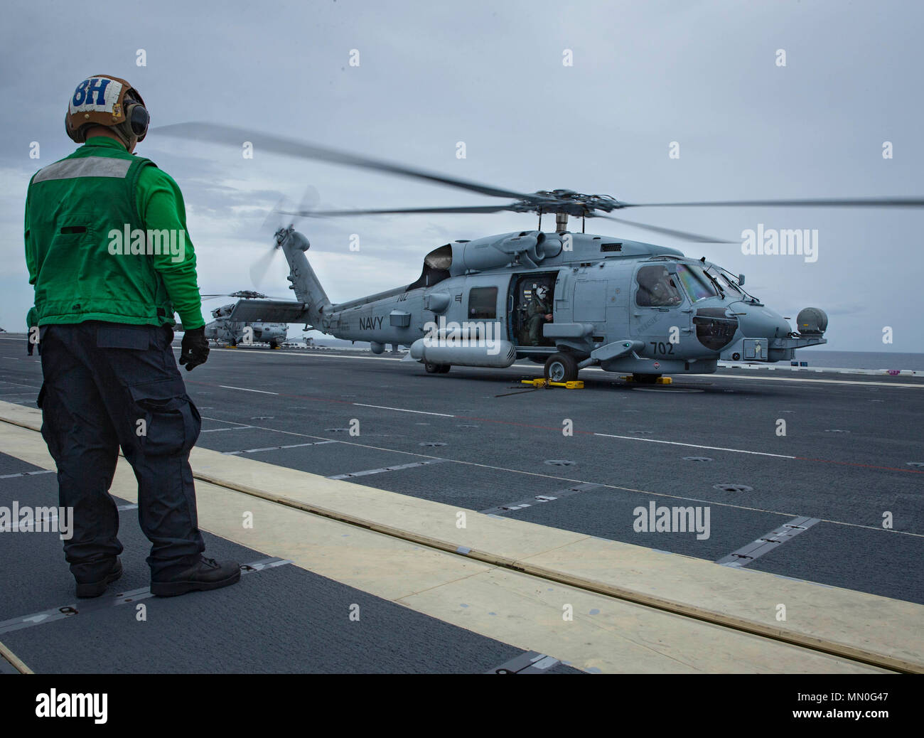 Assigned to helicopter maritime strike squadron hsm 74 hi-res stock ...