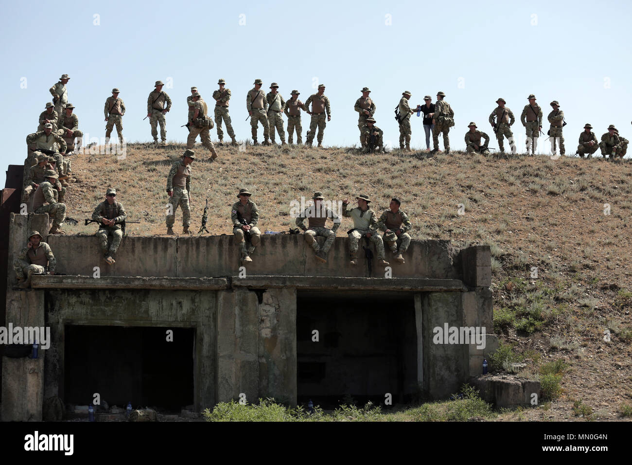 Georgian soldiers get a high point of view to watch training. Vaziani ...