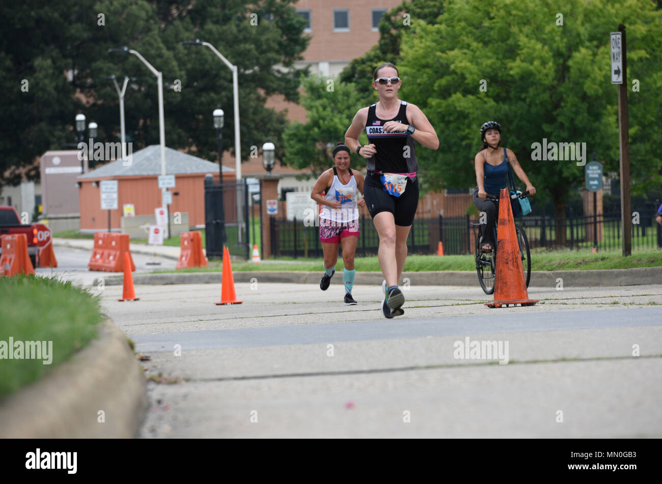 Runners in the Coast Guard Cutter 10K road race dash down Effingham ...
