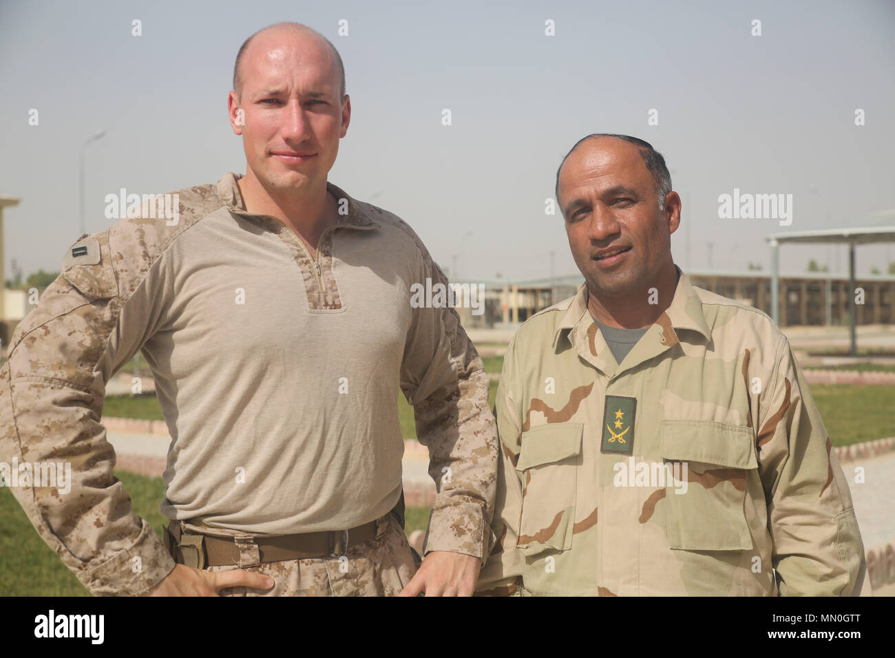 U.S. Marine Capt. Robert Walters, left, an advisor with Task Force ...
