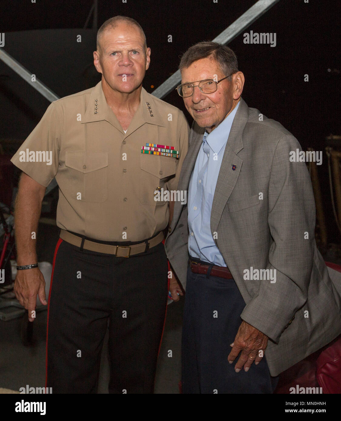 Commandant of the Marine Corps Gen. Robert B. Neller, left, poses for a ...