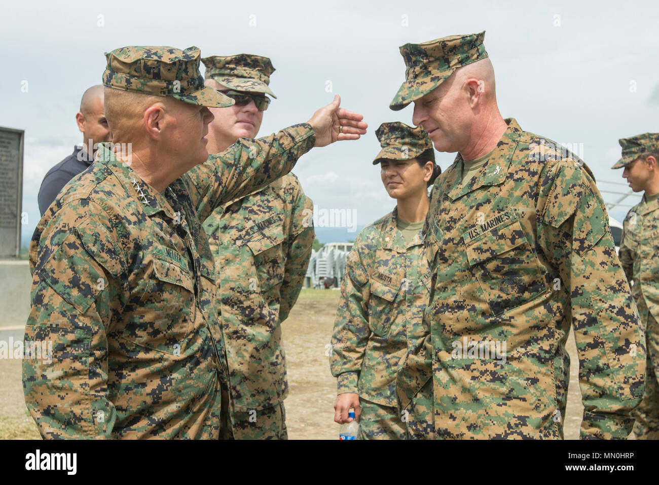 Commandant of the Marine Corps Gen. Robert B. Neller, left, speaks to ...