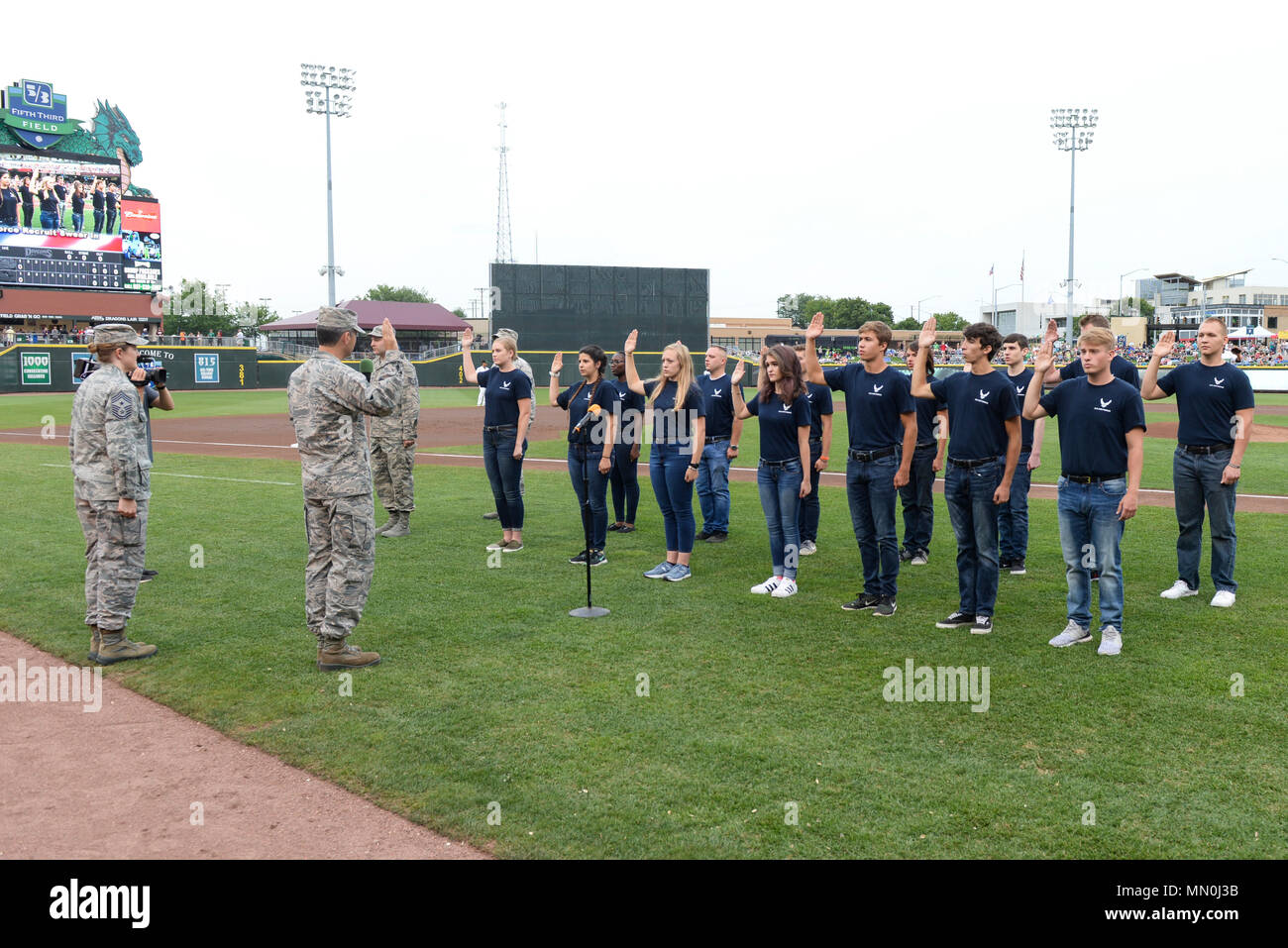 Col. Bradley W. McDonald, 88th Air Base Wing commander, administers the ...