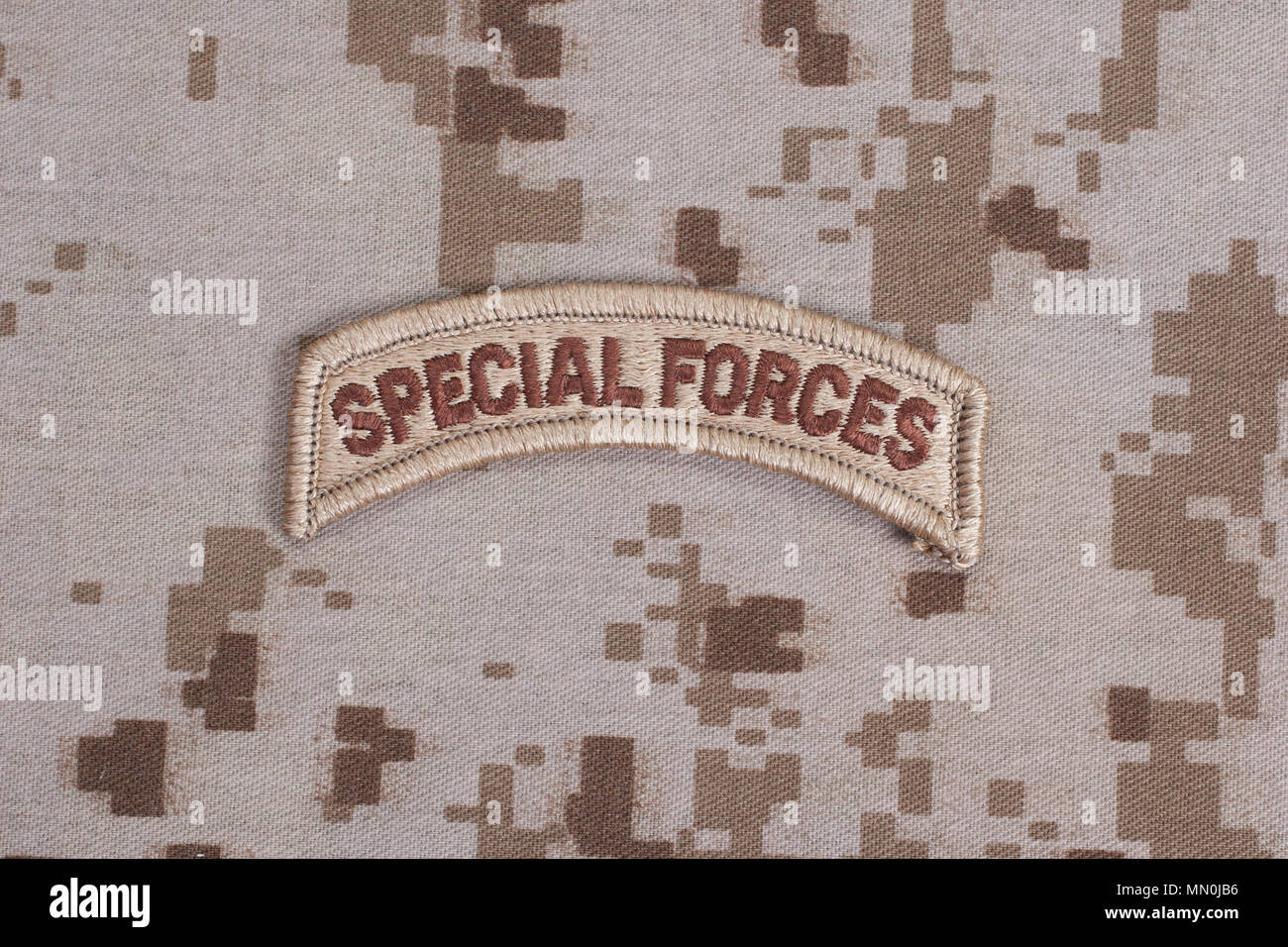 US ARMY special forces tab on camouflage uniform Stock Photo - Alamy