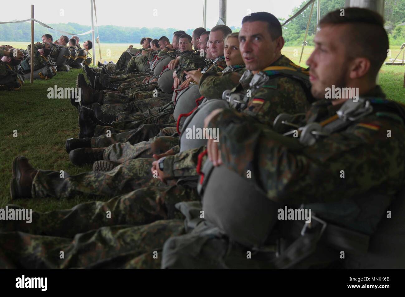 German paratroopers wait in chalk order before boarding a CH-47 Chinook ...