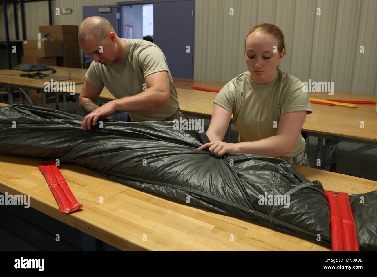 U.S. Army parachute riggers, from the 165th Quartermaster Company ...