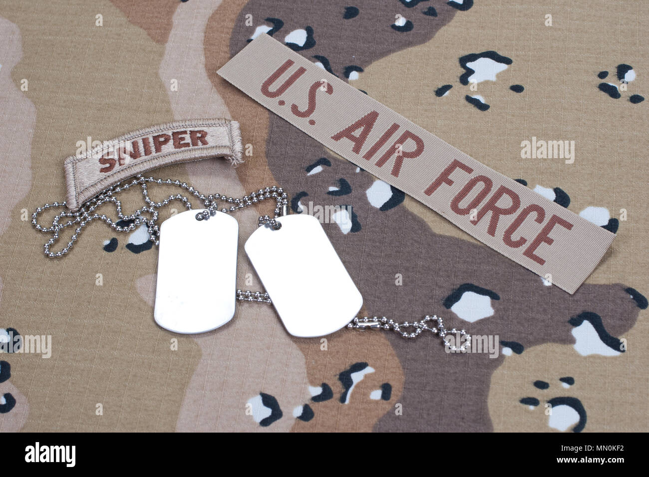 US ARMY sniper tab with blank dog tags on camouflage uniform Stock ...
